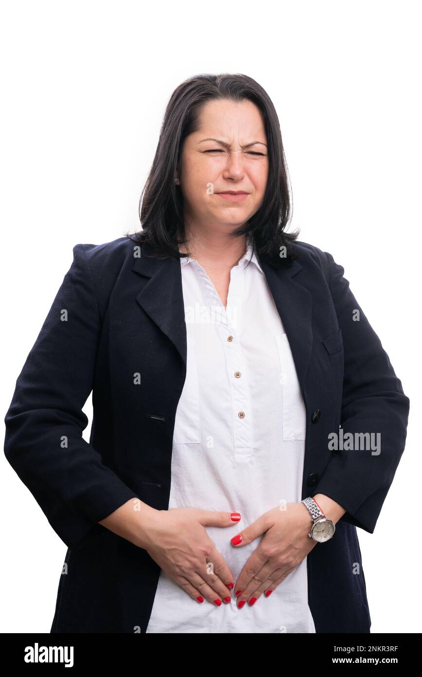 Adult businesswoman in formal clothing having abdominal pms pains ...