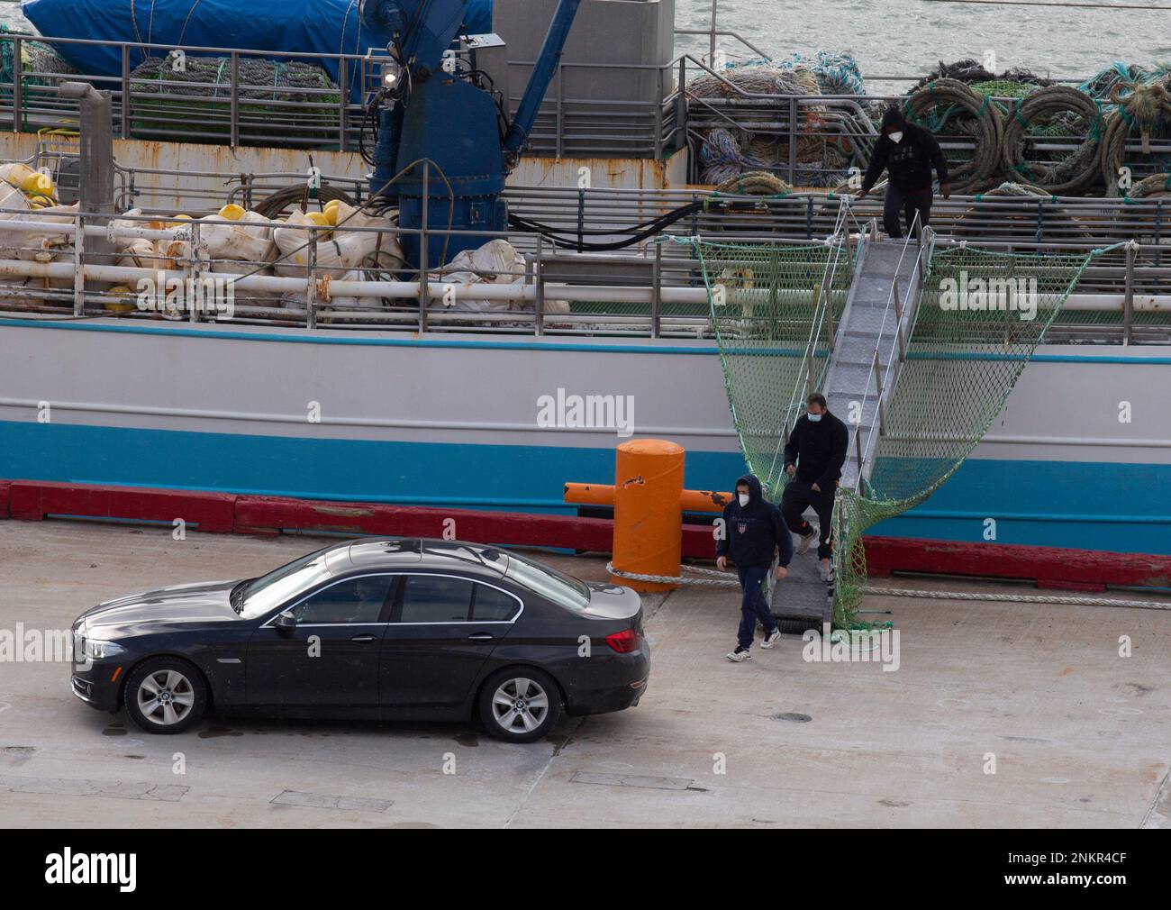 (L-R) The skipper, Juan Padín; his nephew, Eduardo Rial Padín; and ...