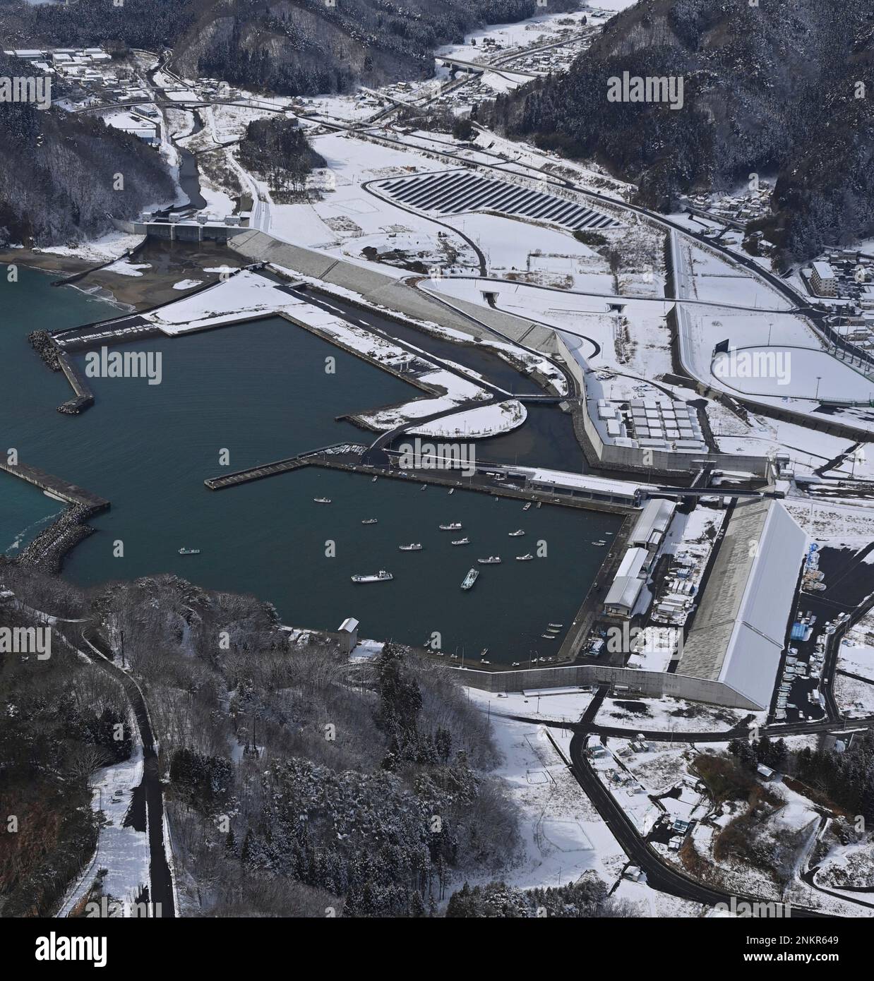 An aerial photo shows the seawall of Taro in Miyako City, Iwate ...