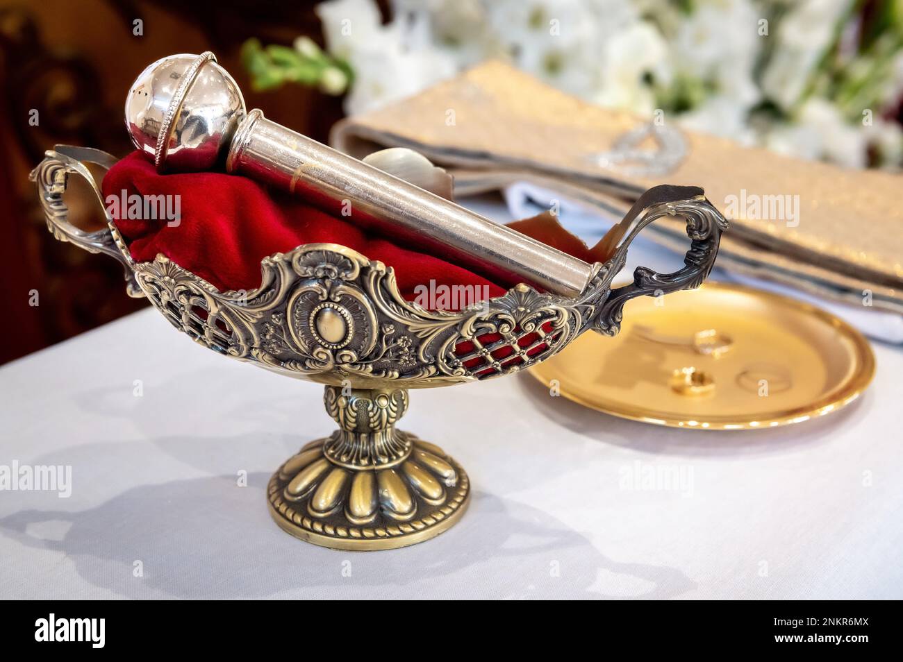 interiors and details in catholic church view of the altar, rings and ...