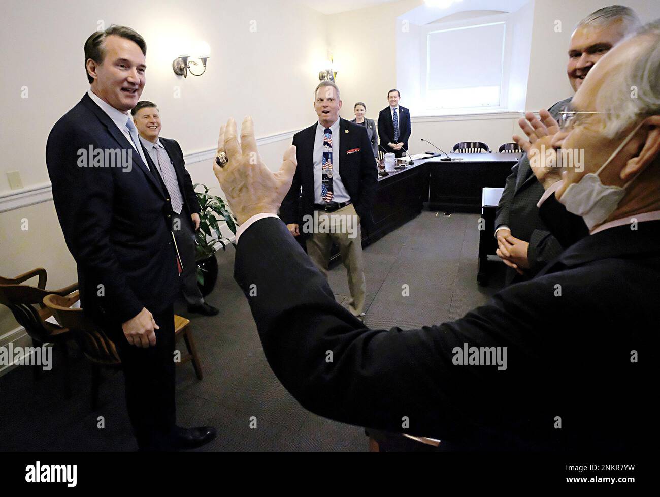 Virginia Gov. Glenn Youngkin, left, was greeted by Senate Minority ...