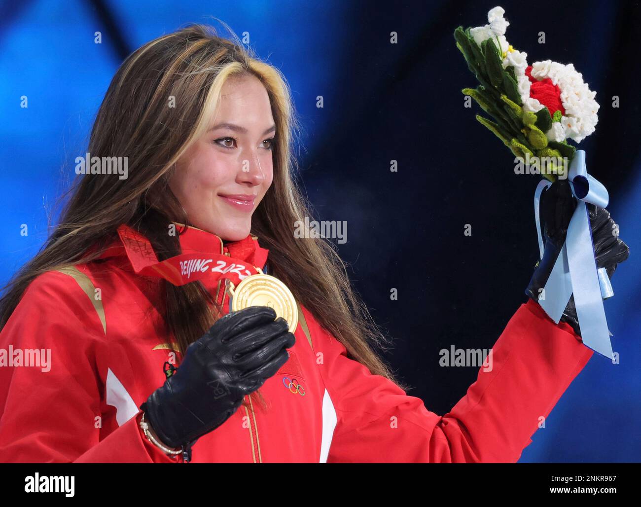 China's Ailing Eileen GU attends the victory ceremony of the Women's Freeski Halfpipe at ...