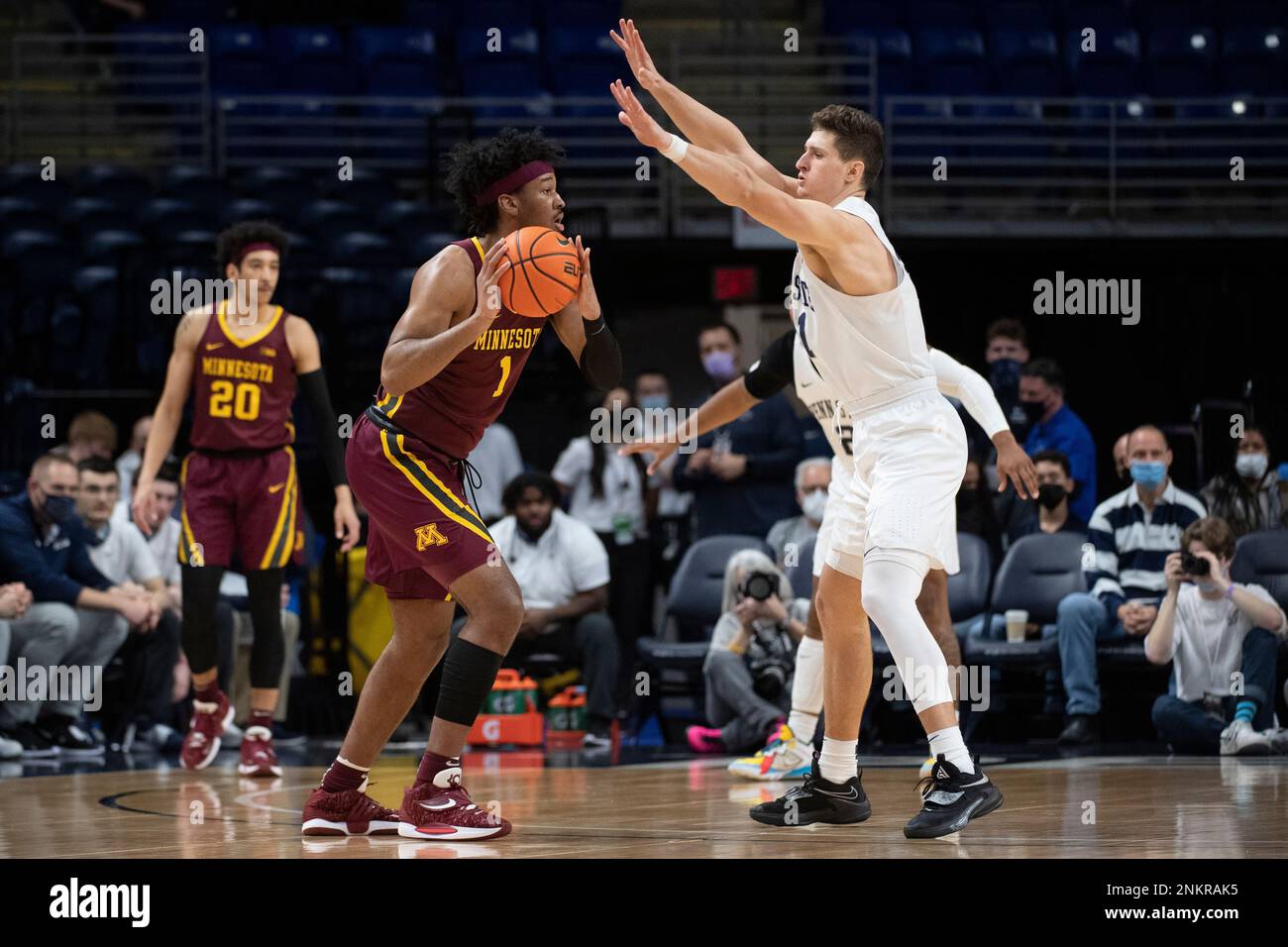 Penn State forward John Harrar (21) guards Minnesota forward Eric Curry ...
