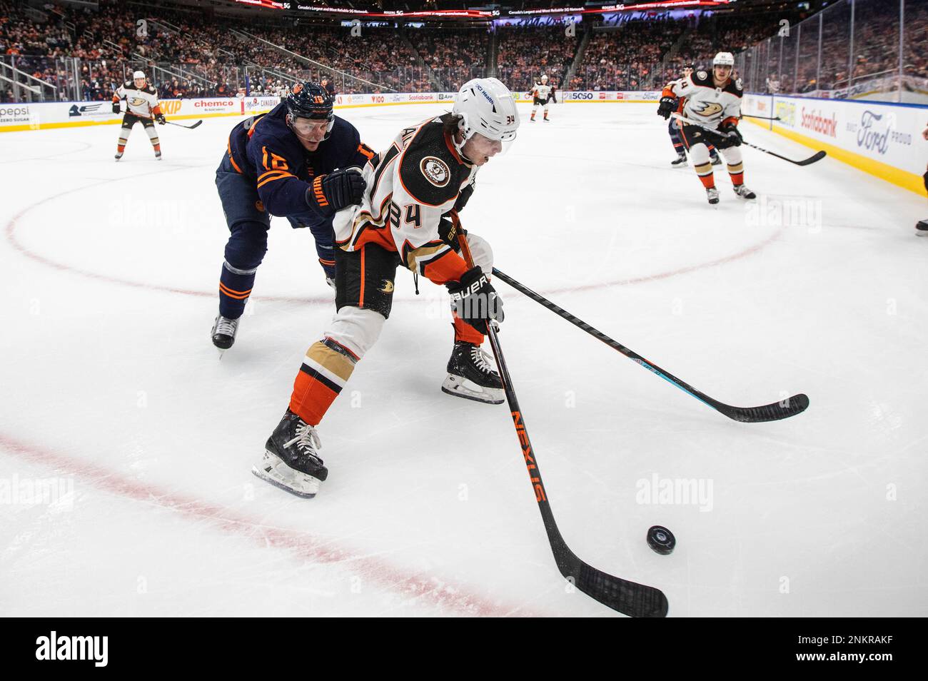 Anaheim Ducks' Jamie Drysdale (34) and Edmonton Oilers' Zach Hyman (18 ...