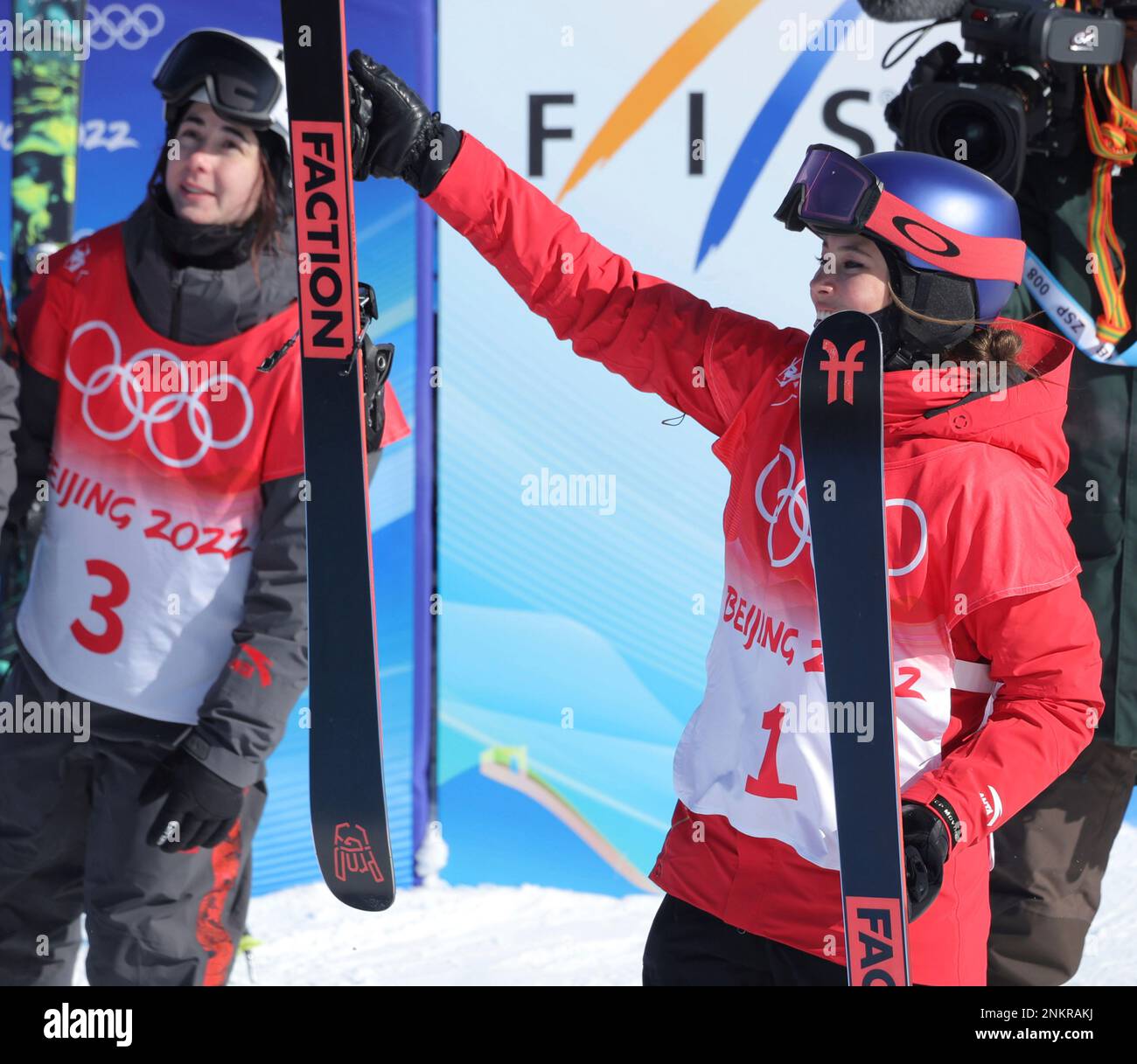 China's Ailing Eileen GU (R) celebrates after finishing her third ...