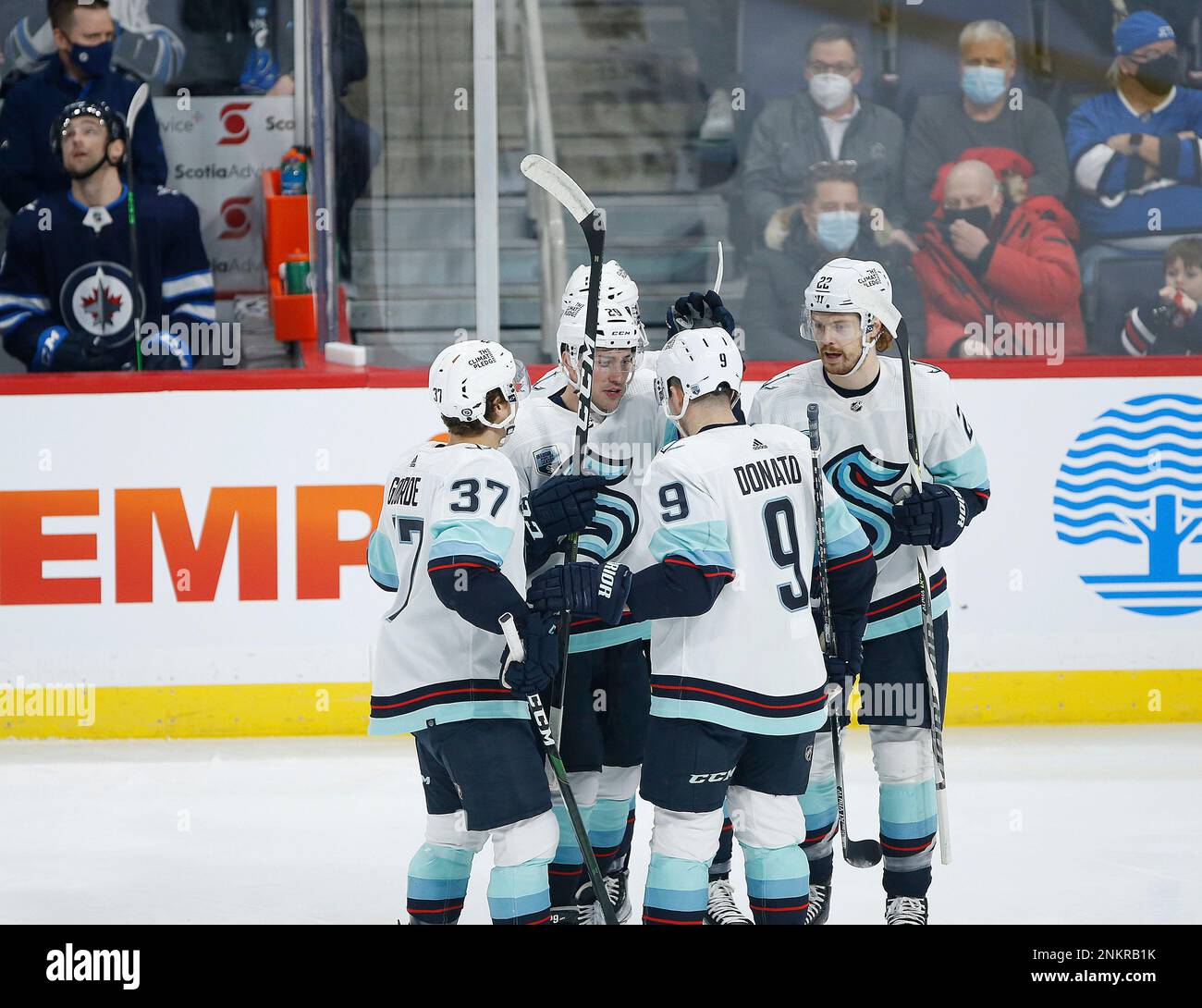 Seattle Kraken's Yanni Gourde (37), Vince Dunn (29), Ryan Donato (9 ...