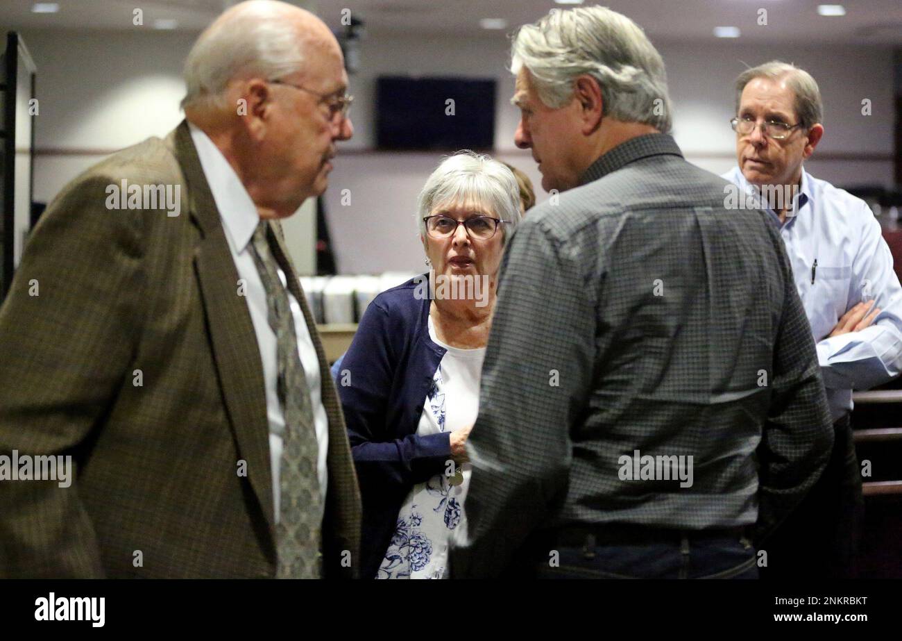 Vivian Reeves, 75, center, prepares to leave court while attending the ...