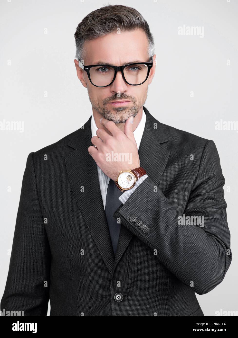 charismatic mature leader in formal business suit and spectacles Stock ...