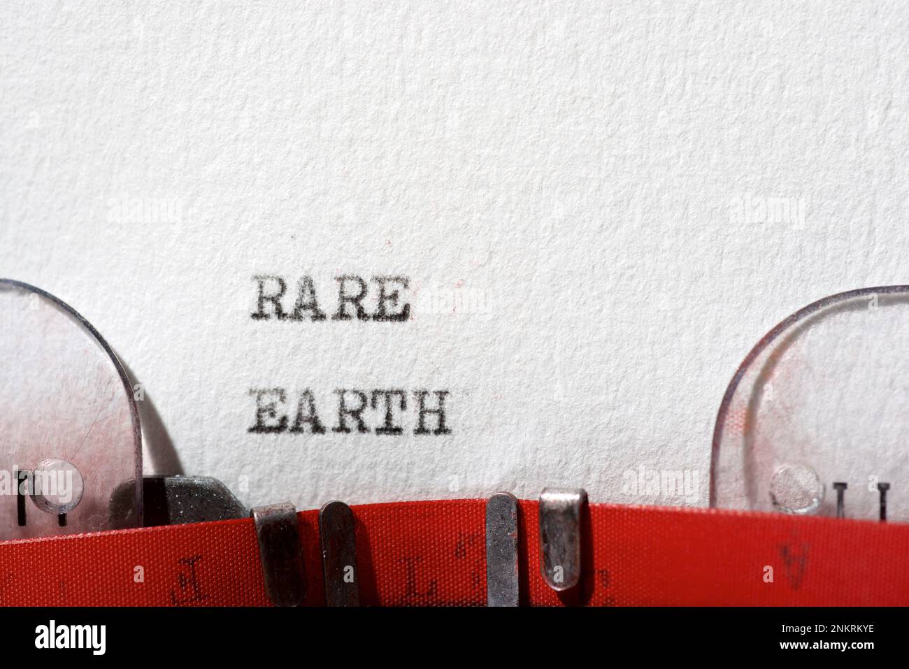 Rare earth text written with a typewriter Stock Photo - Alamy