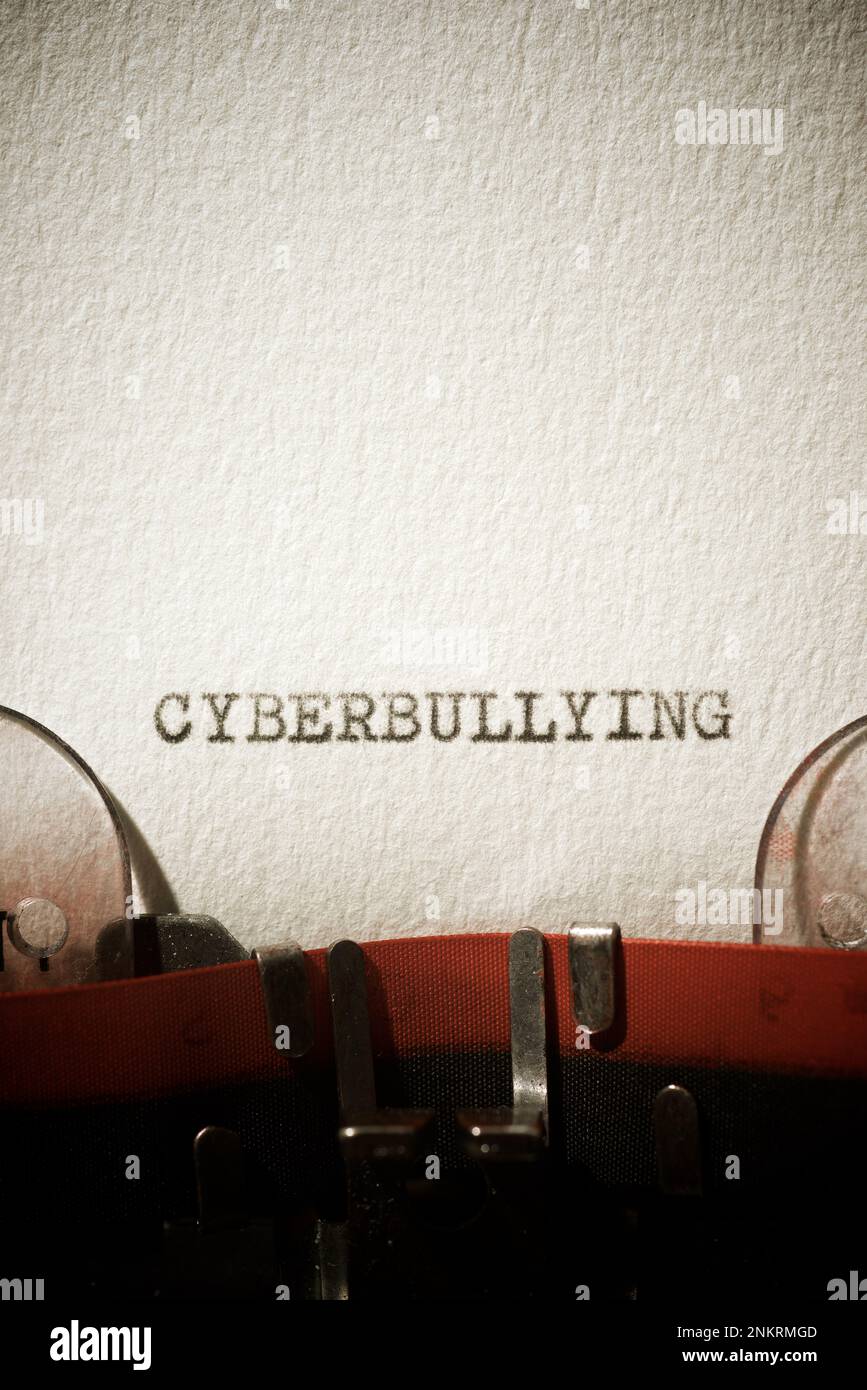 Cyberbullying word written with a typewriter Stock Photo - Alamy