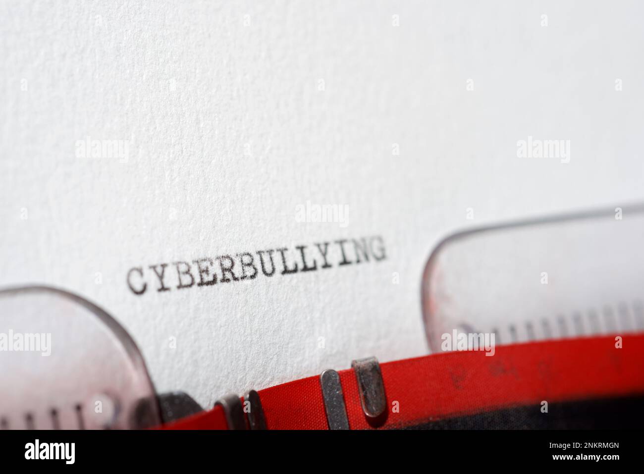 Cyberbullying word written with a typewriter Stock Photo - Alamy