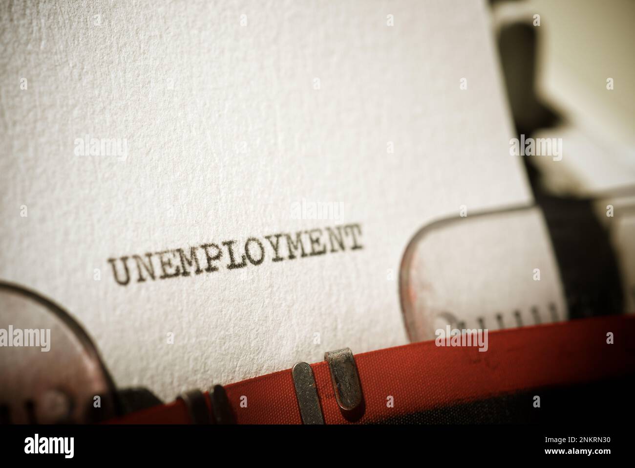 Unemployment word written with a typewriter Stock Photo - Alamy