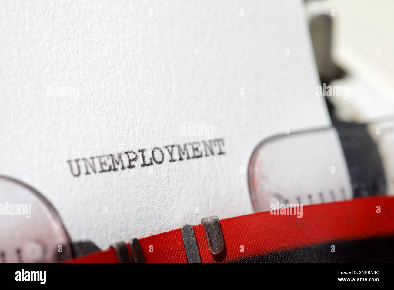 Unemployment word written with a typewriter Stock Photo - Alamy