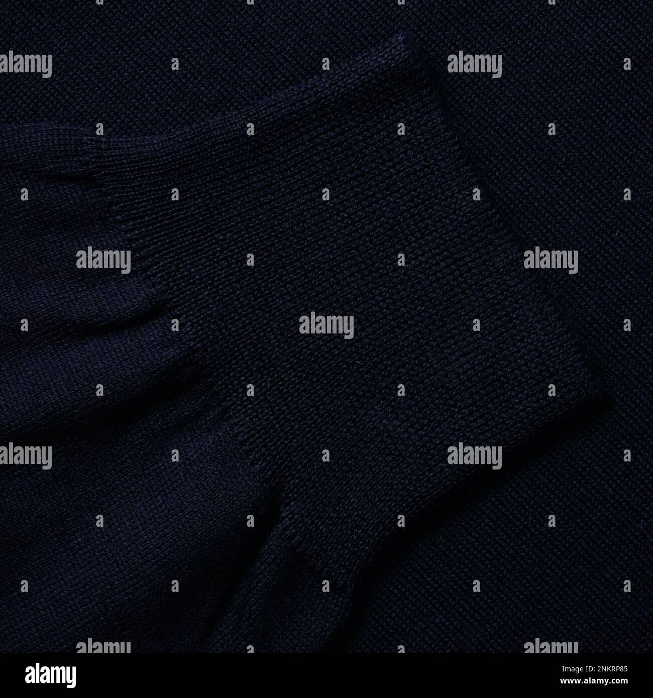 Blue wool sweater sleeve close up background Stock Photo - Alamy