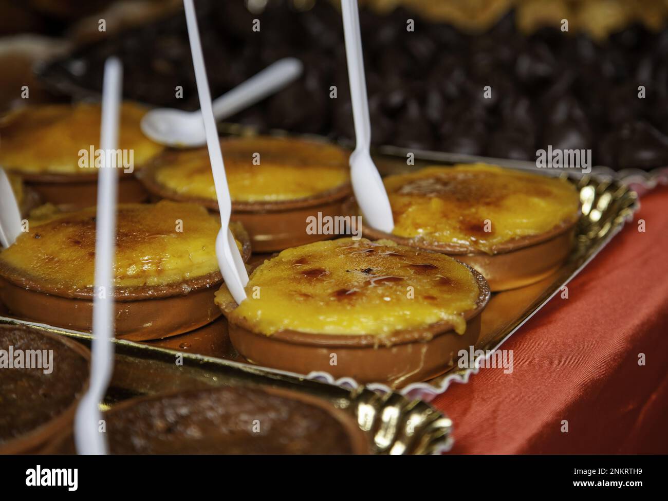 Detail of traditional Spanish dessert in an old market, unhealthy sweet ...