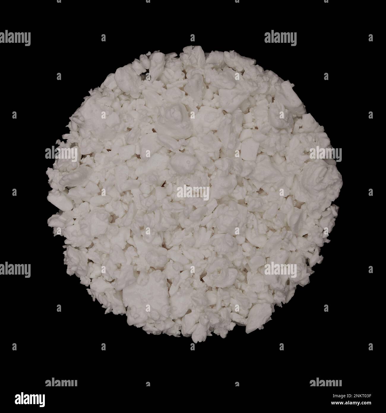 Cottage cheese round texture background isolated on black background ...