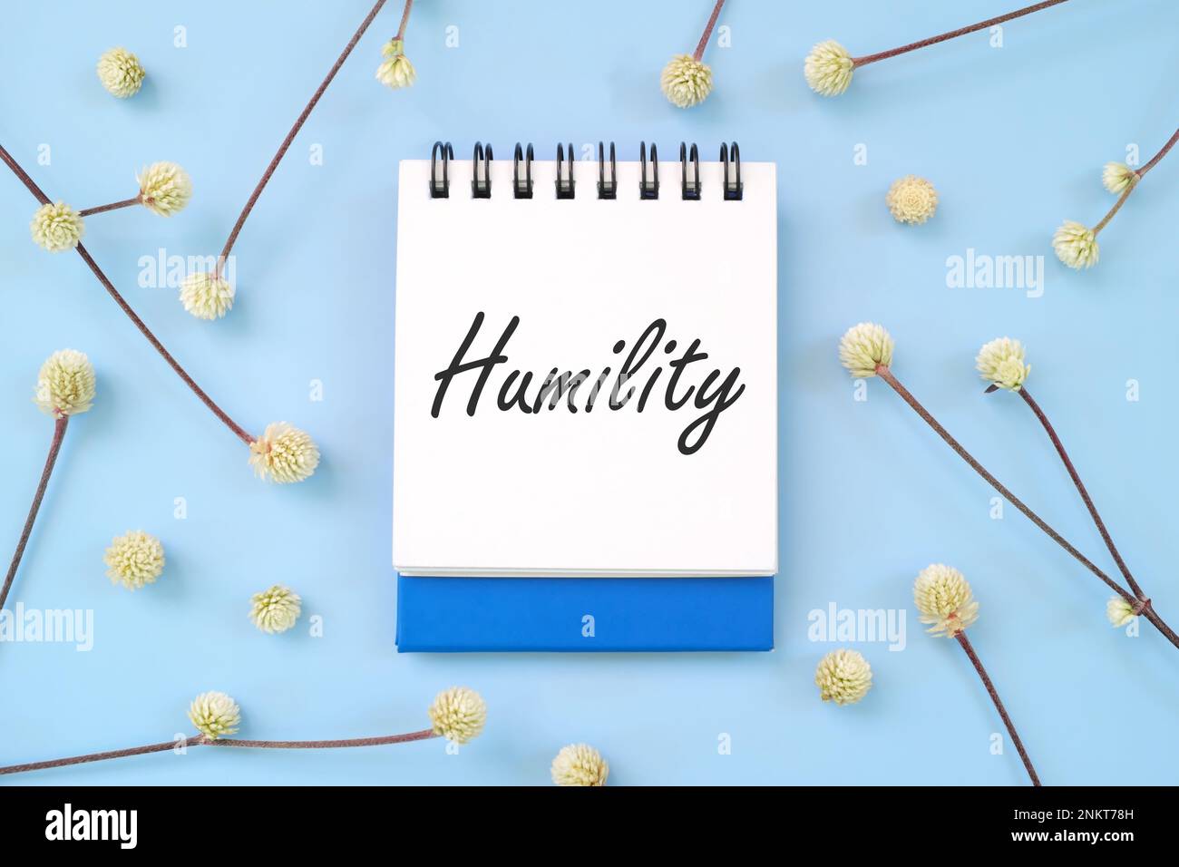 Humility character and personality concept. Word written on blue ...