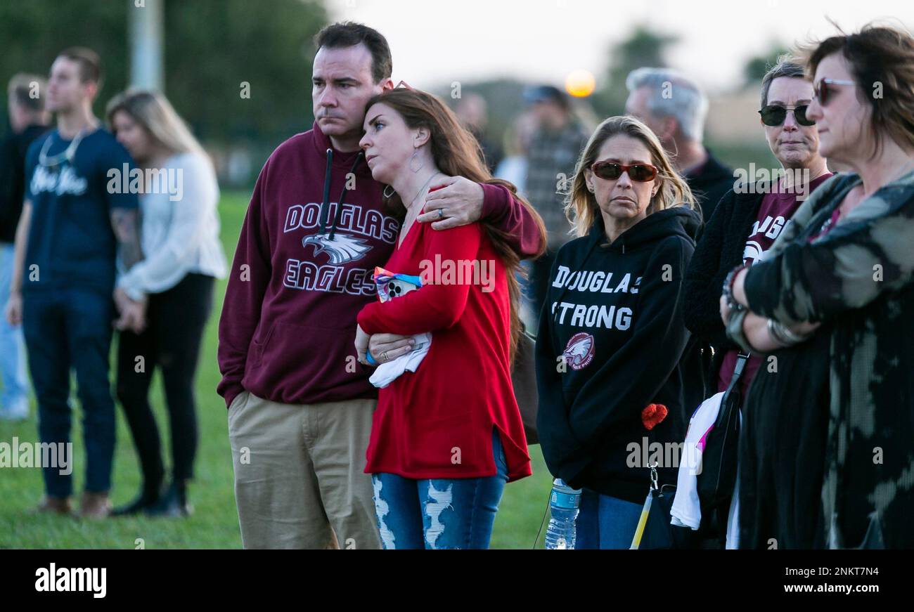 Visitors attend a community commemoration event for the Marjory ...