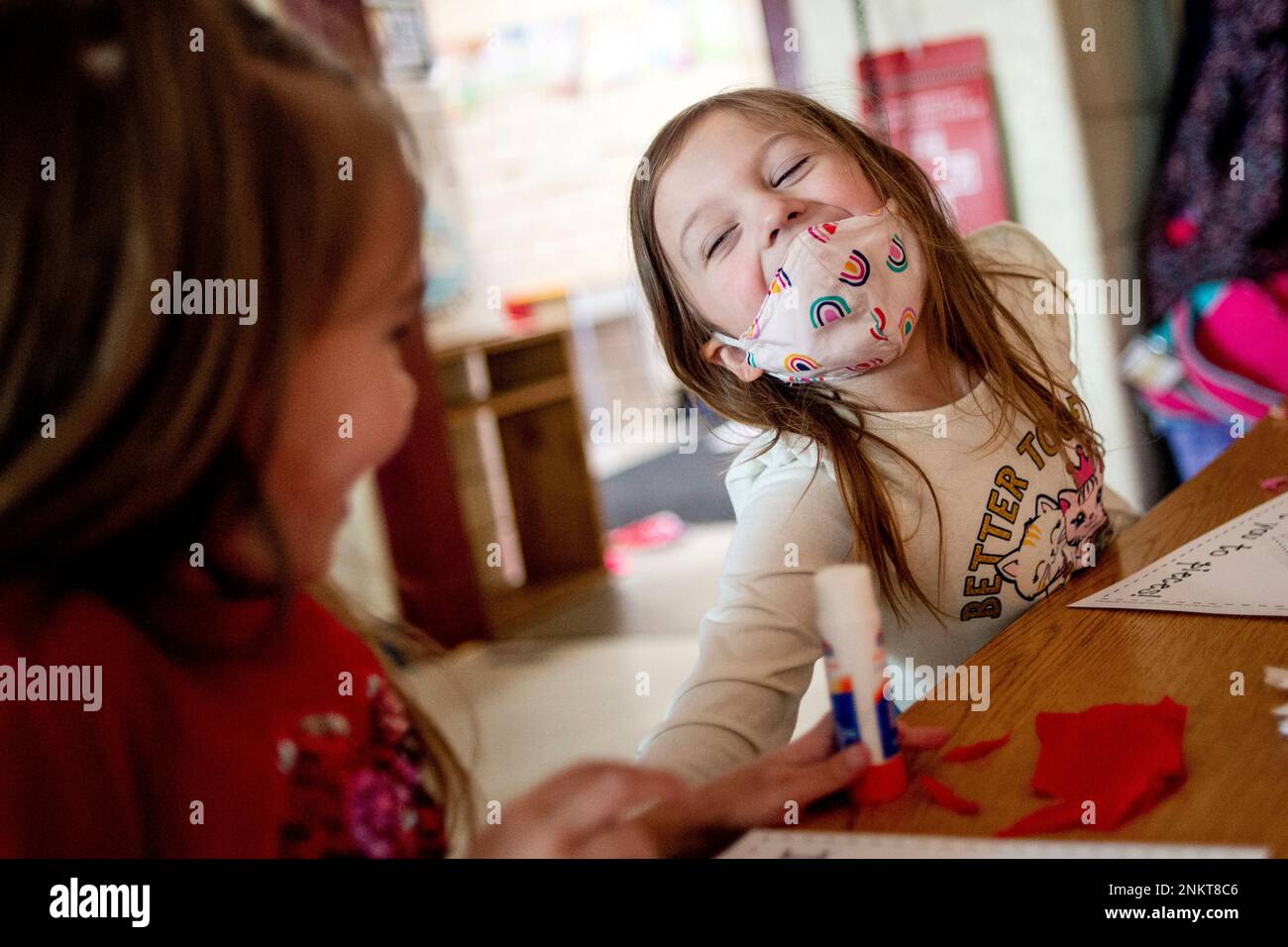 Isabella Nelson laughs as she tells a joke to Rhiannon DeLauter, left ...