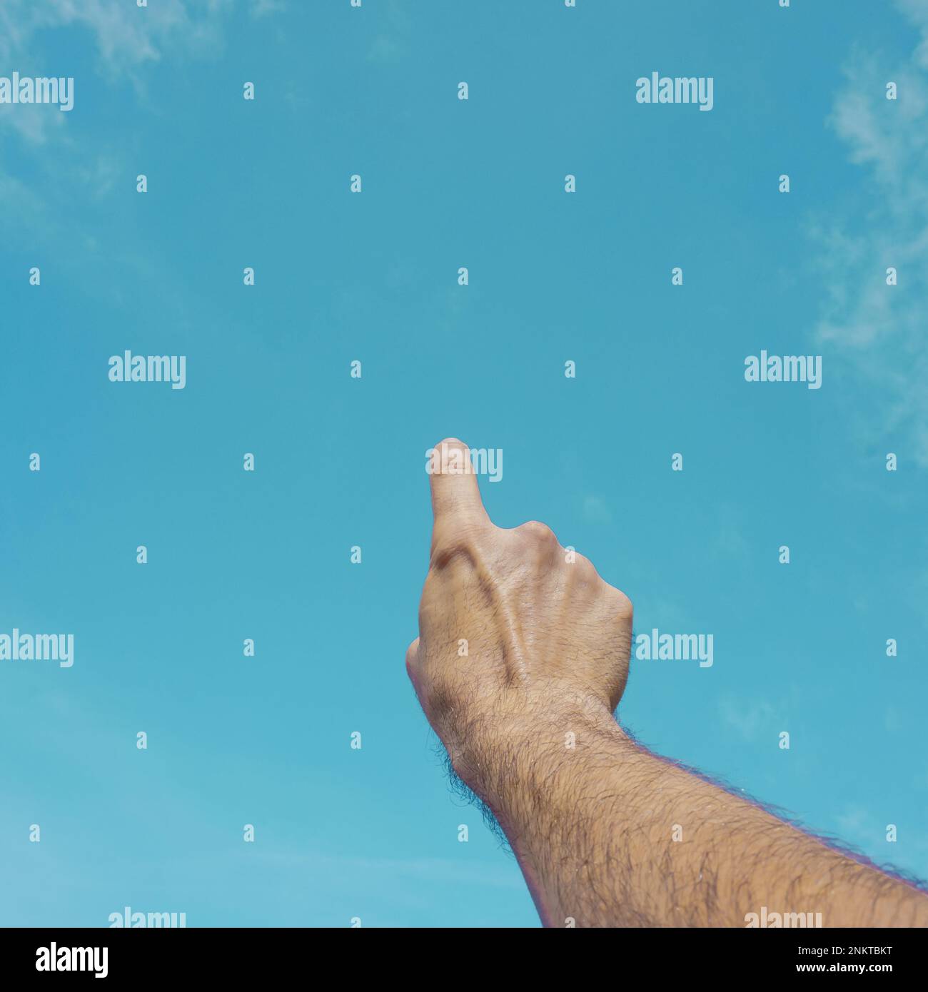 hand up gesturing in the blue sky, feelings and emotions Stock Photo ...