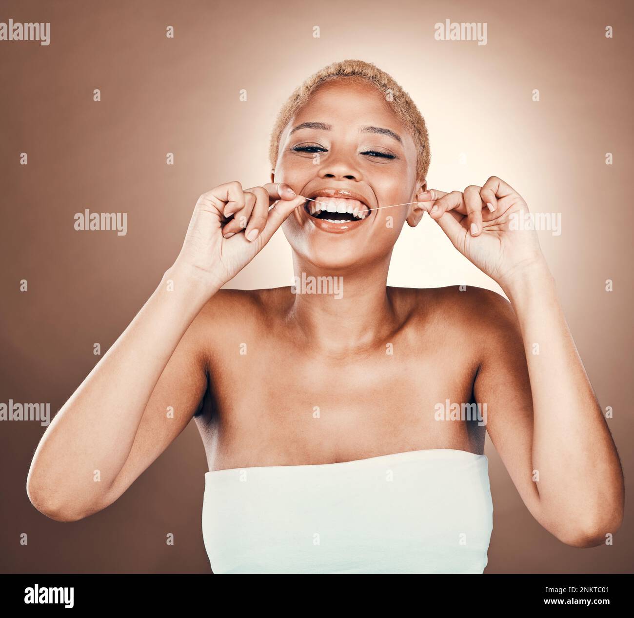 Teeth, dental floss and portrait of black woman on a brown background ...