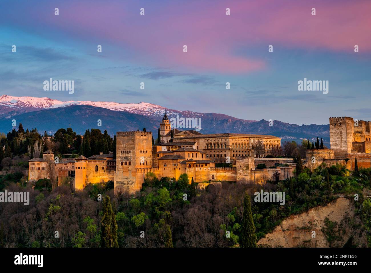 Exterior view of Alhambra Palace at sunset, Granada, Andalusia, Spain ...