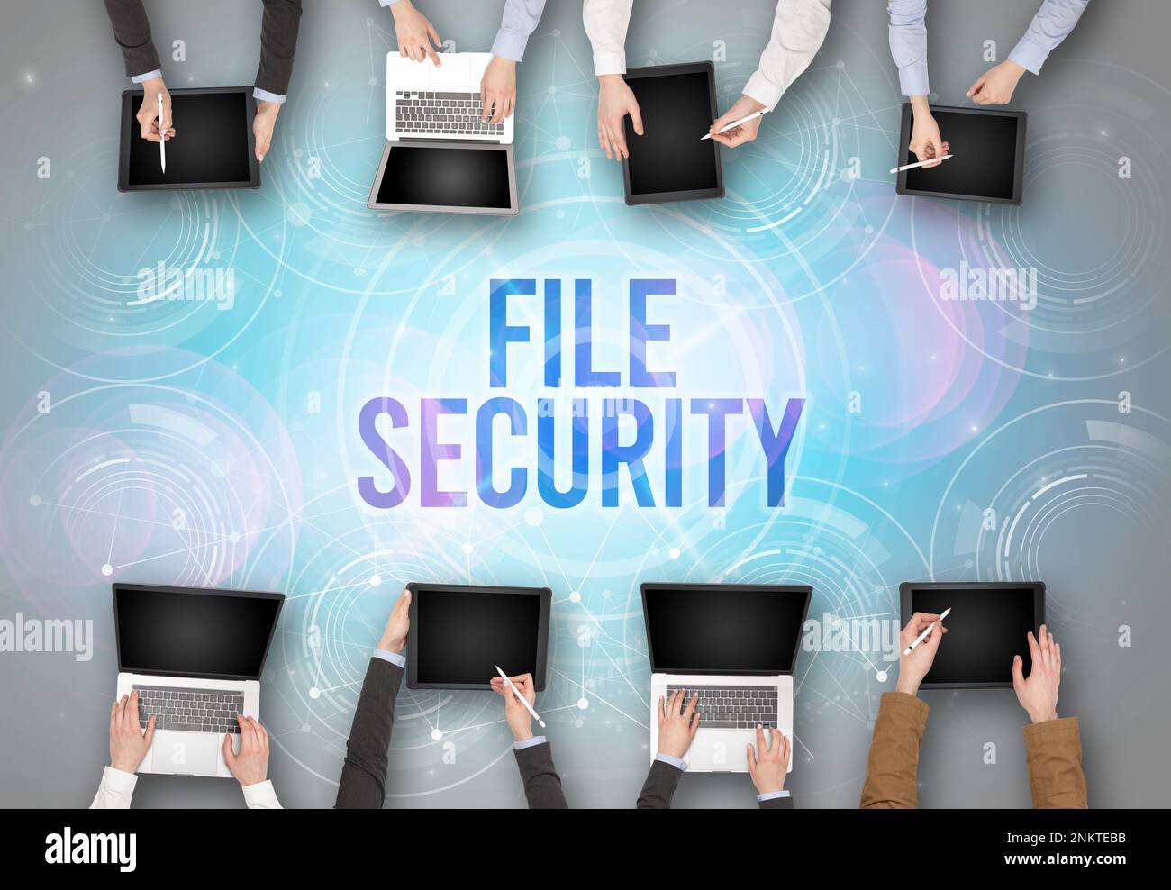 Group of people in front of a laptop, security concept Stock Photo - Alamy