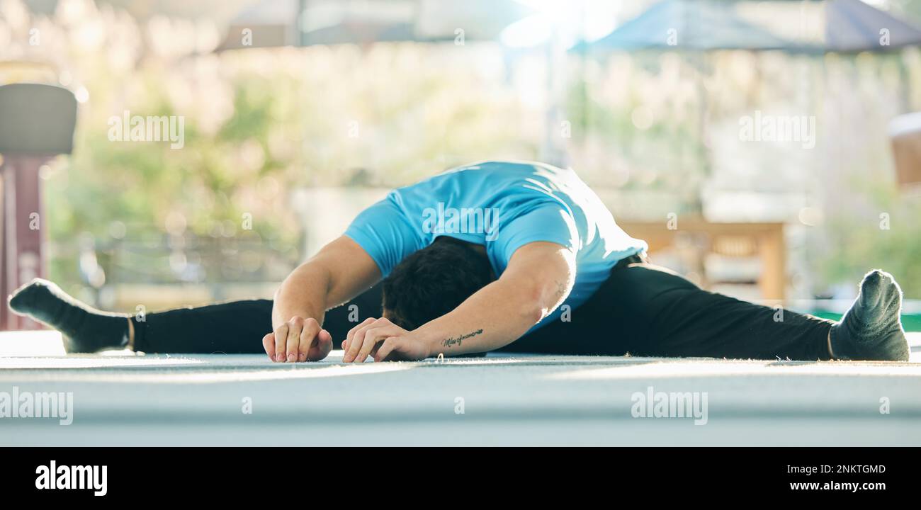 Gymnast stretching, man in gym with fitness and flexibility ...