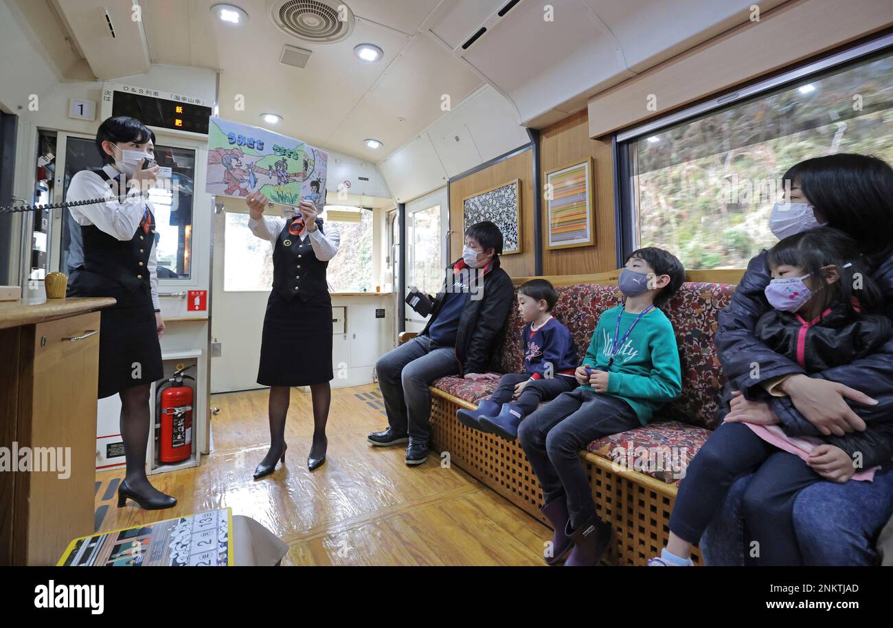 The staffs tell a story with picture cards inside of a sightseeing ...