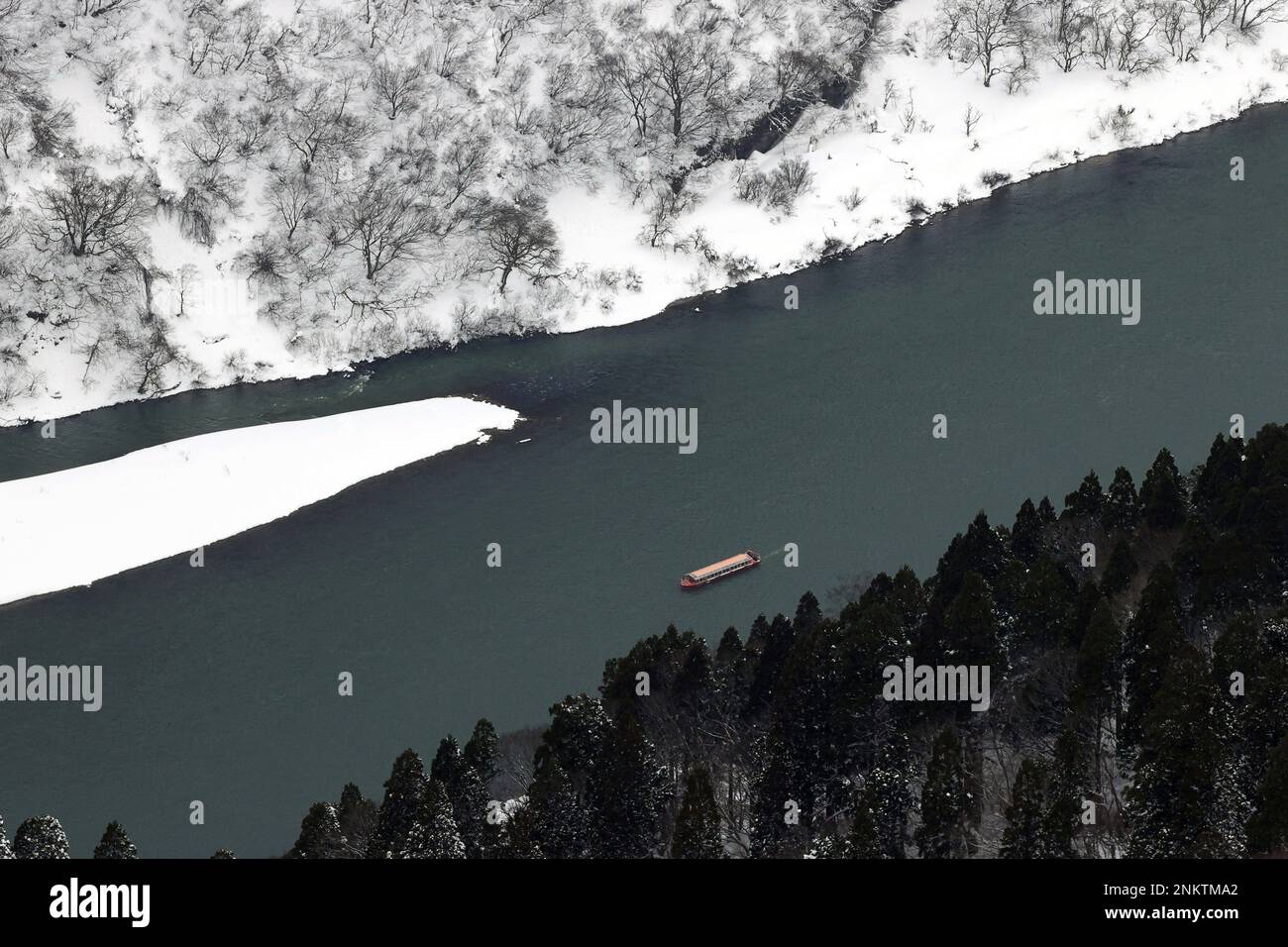 An aerial picture shows Mogami-gawa River in snow-covered Tozawa ...