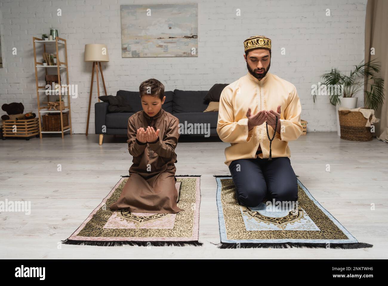 Muslim praying home hi-res stock photography and images - Alamy