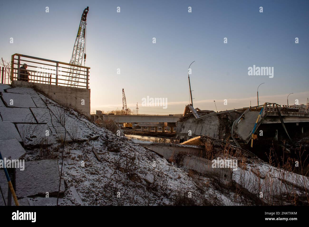 The destroyed, demolished, bridge over the Irpin River in the town of ...