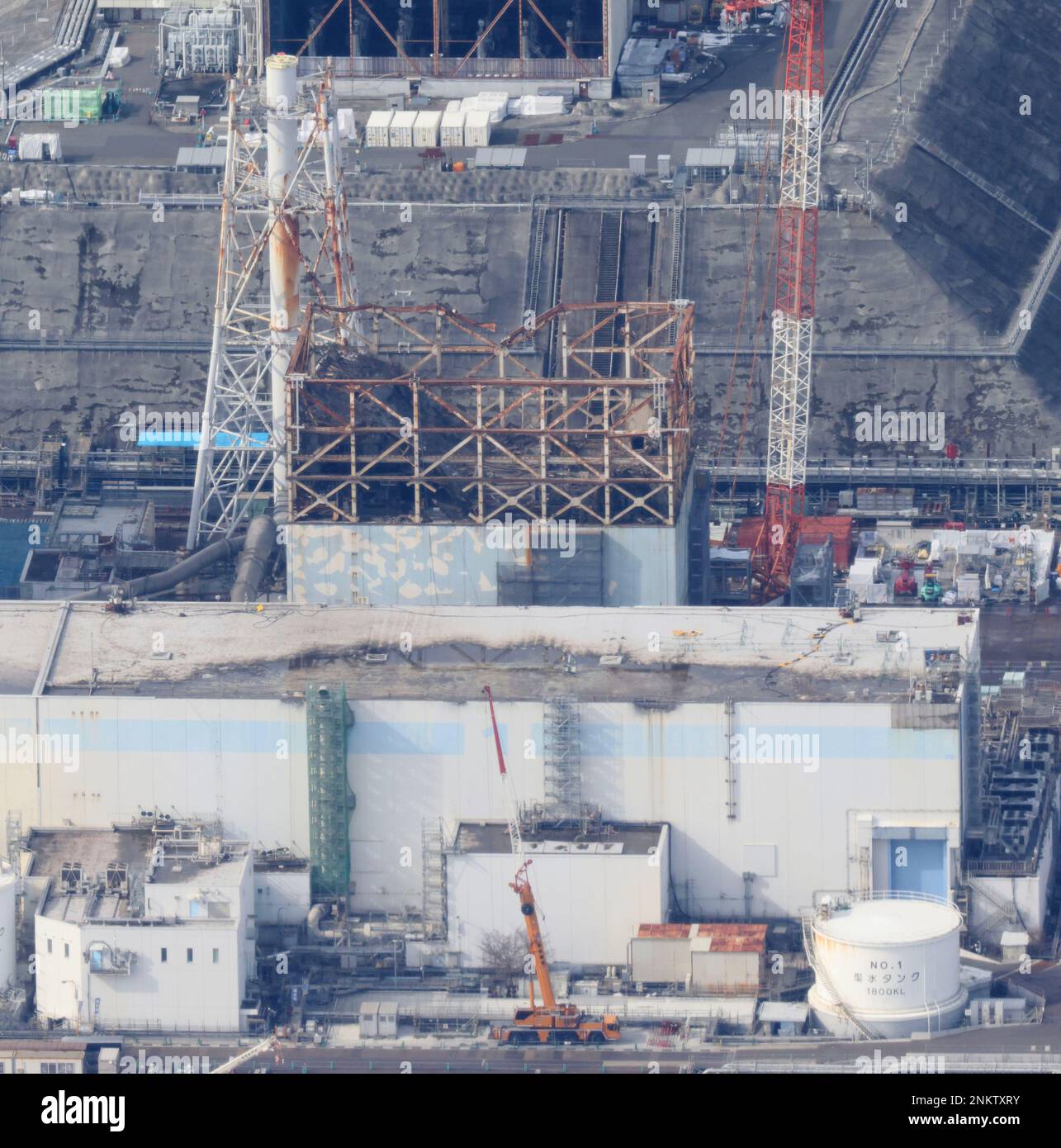 An aerial photo shows Unit 1 of the Fukushima No. 1 Nuclear Power Plant ...