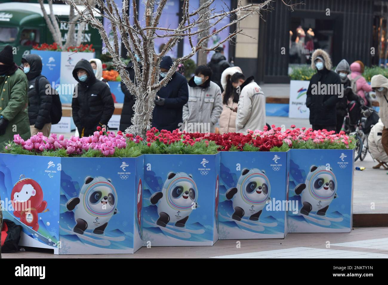 People line up early in the morning to buy Bing Dwen Dwen, the mascot of the 2022 Beijing Winter ...