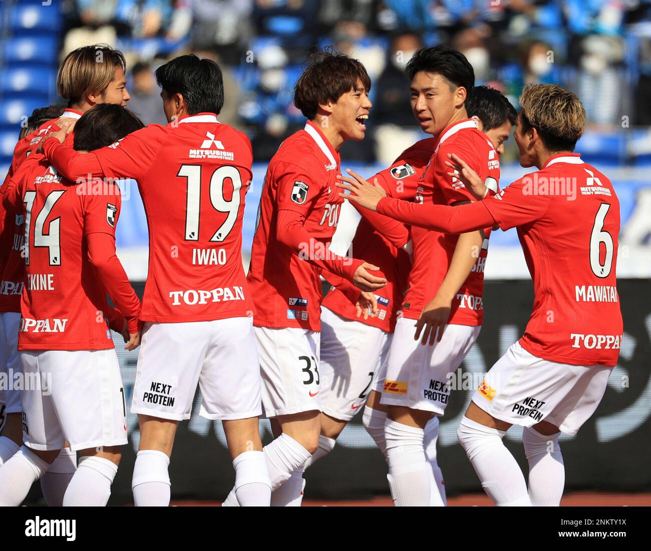 Ataru Esaka (C), Japanese footballer of Urawa Red Diamonds, celebrate ...