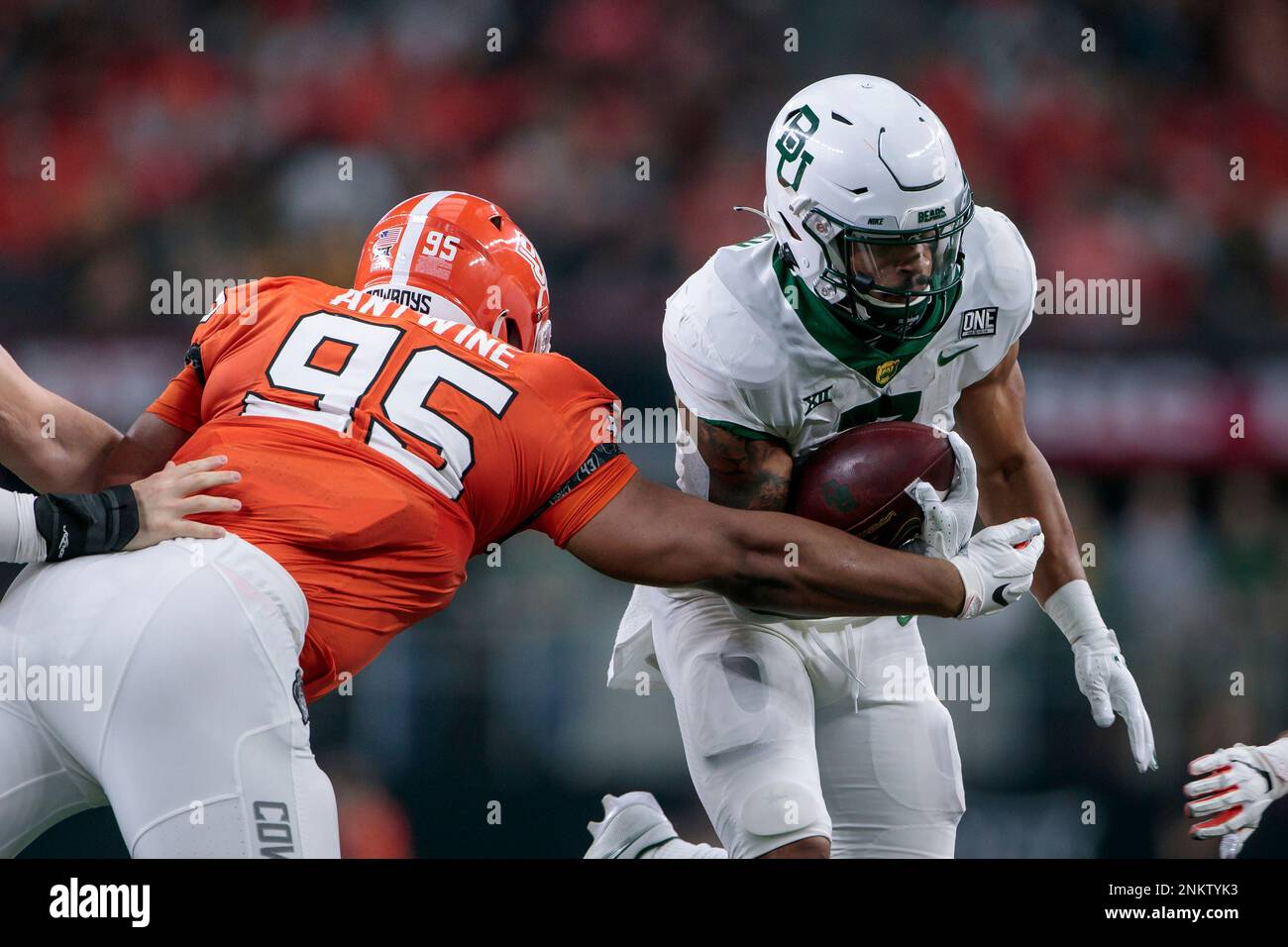 ARLINGTON, TX - DECEMBER 04: Oklahoma State Cowboys defensive tackle ...
