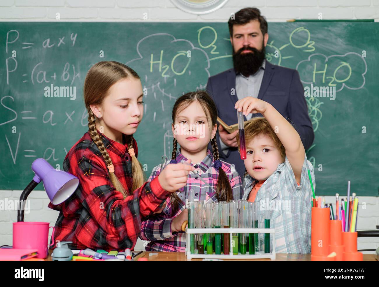 Teaching kids sharing important knowledge. Study with friends is fun ...