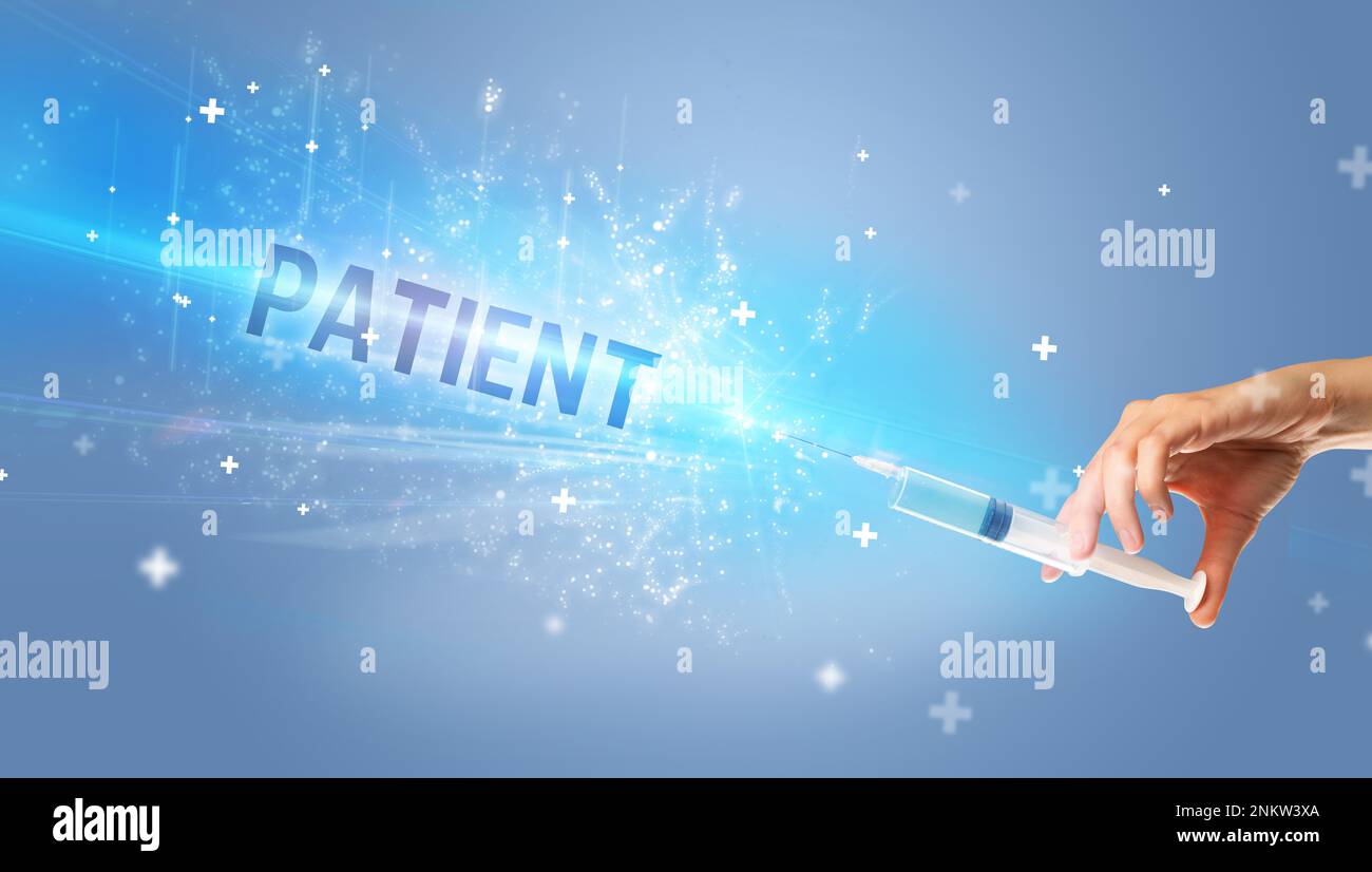 Syringe, medical injection in hand Stock Photo - Alamy