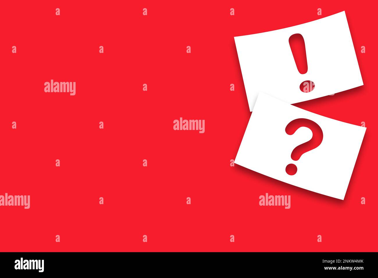 White pieces of paper with question marks and exclamation marks against ...