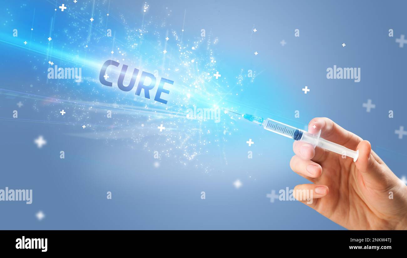 Syringe, medical injection in hand Stock Photo - Alamy