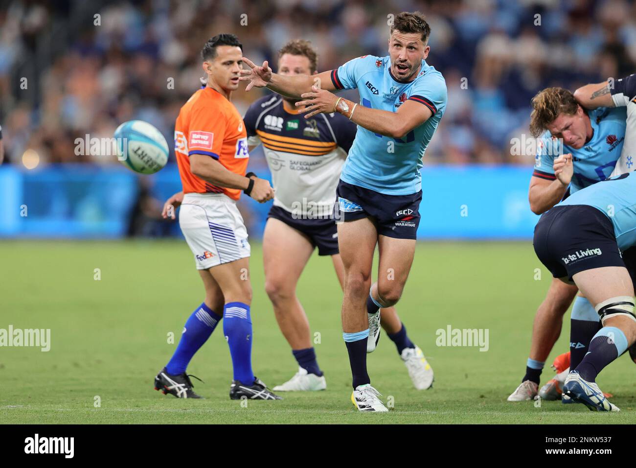 SYDNEY, AUSTRALIA - FEBRUARY 24: Jake Gordon of Waratahs passes the ...