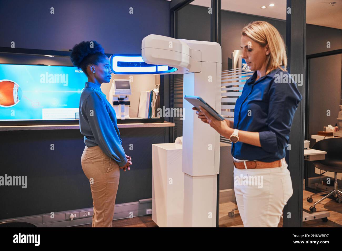 Eye exam, digital machine and optometrist with black woman for eyesight ...