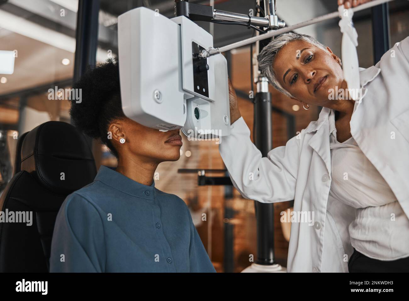Eye exam, vision and woman patient in optometry clinic for testing ...