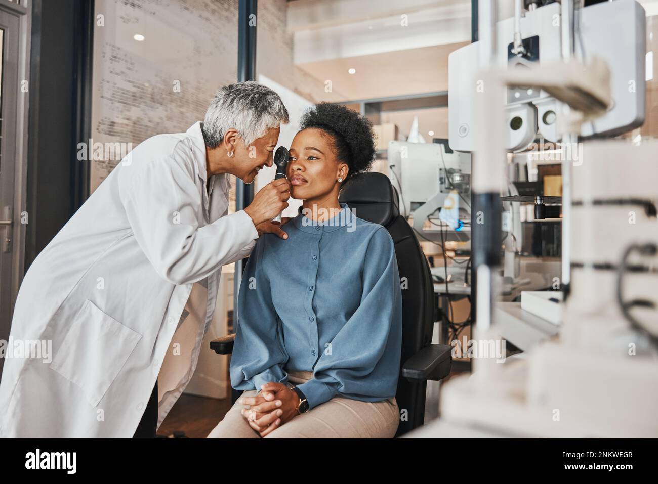 Doctor, vision or black woman in eye exam consultation or assessment ...