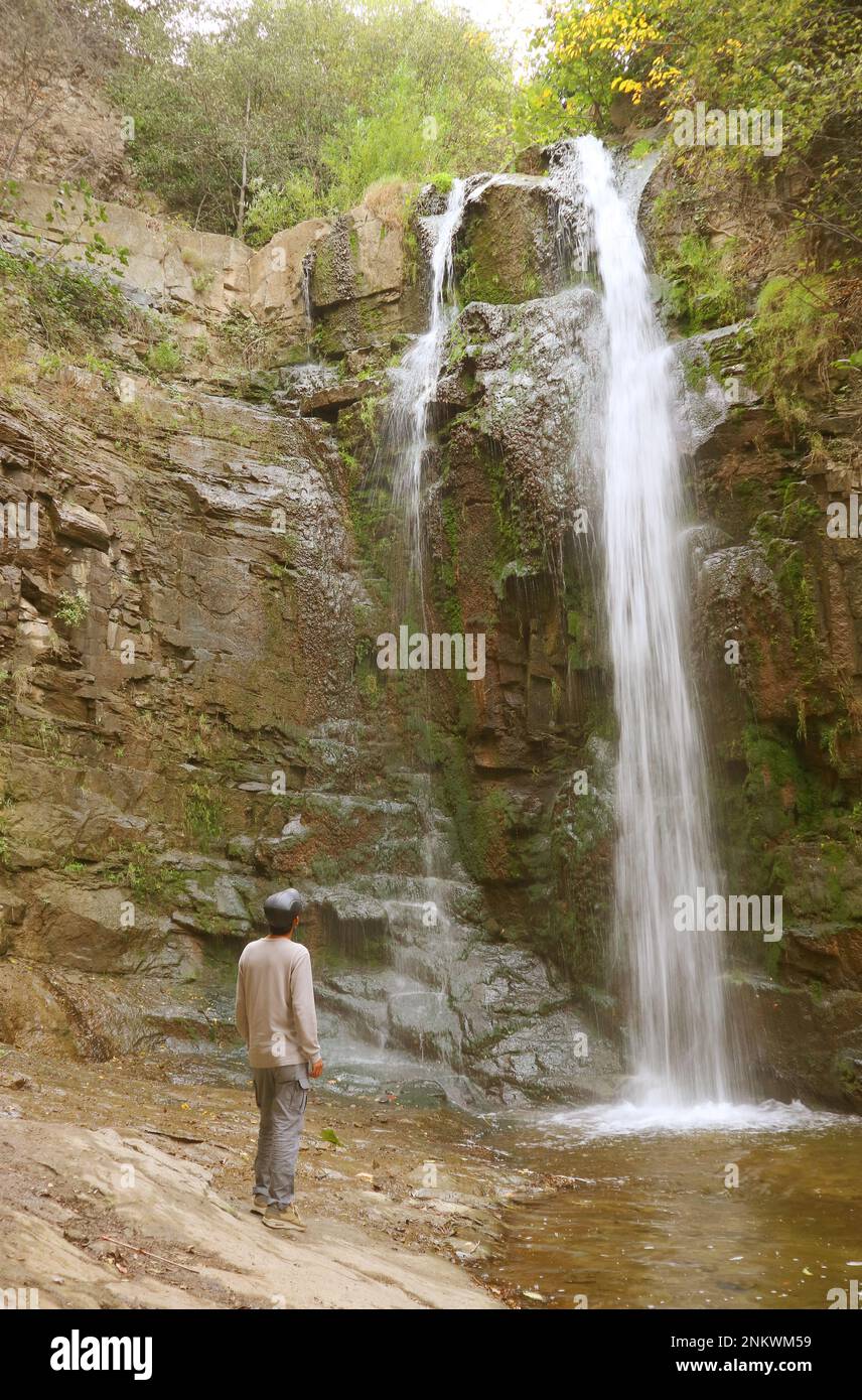 Traveler Being Impressed by the Leghvtakhevi Waterfall, One of the ...