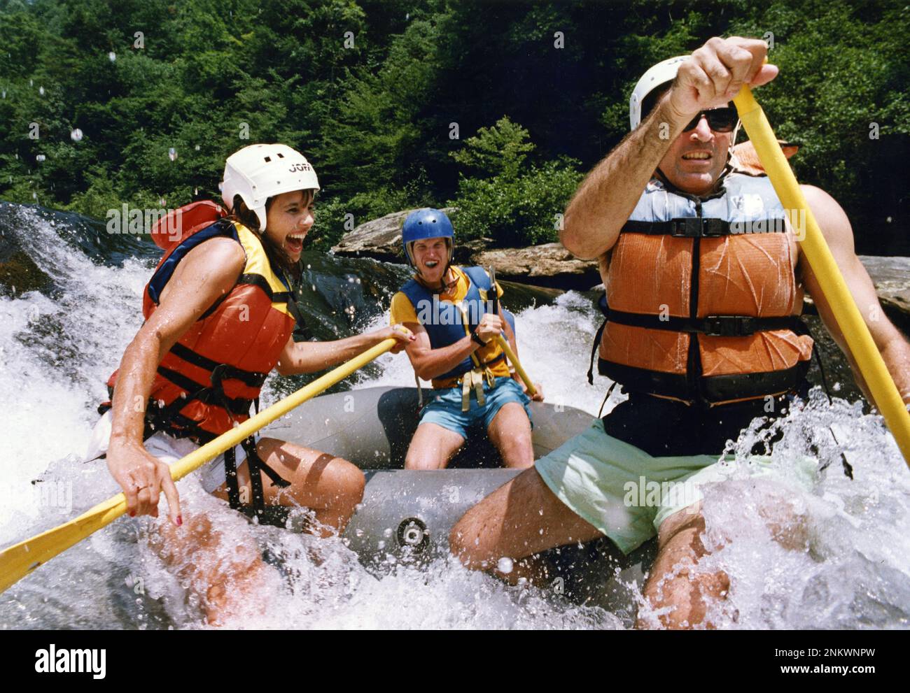 Rafters Bonnie Ingram, left, and Jeremy Rutenberg, right, paddle ...