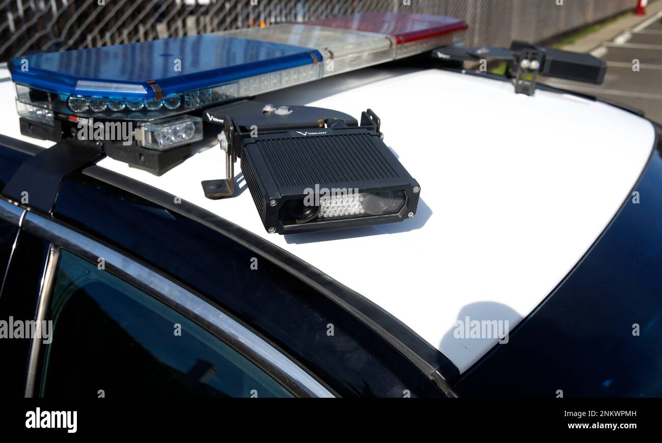 Mobile license plate readers are mounted on the roof a police cruiser ...
