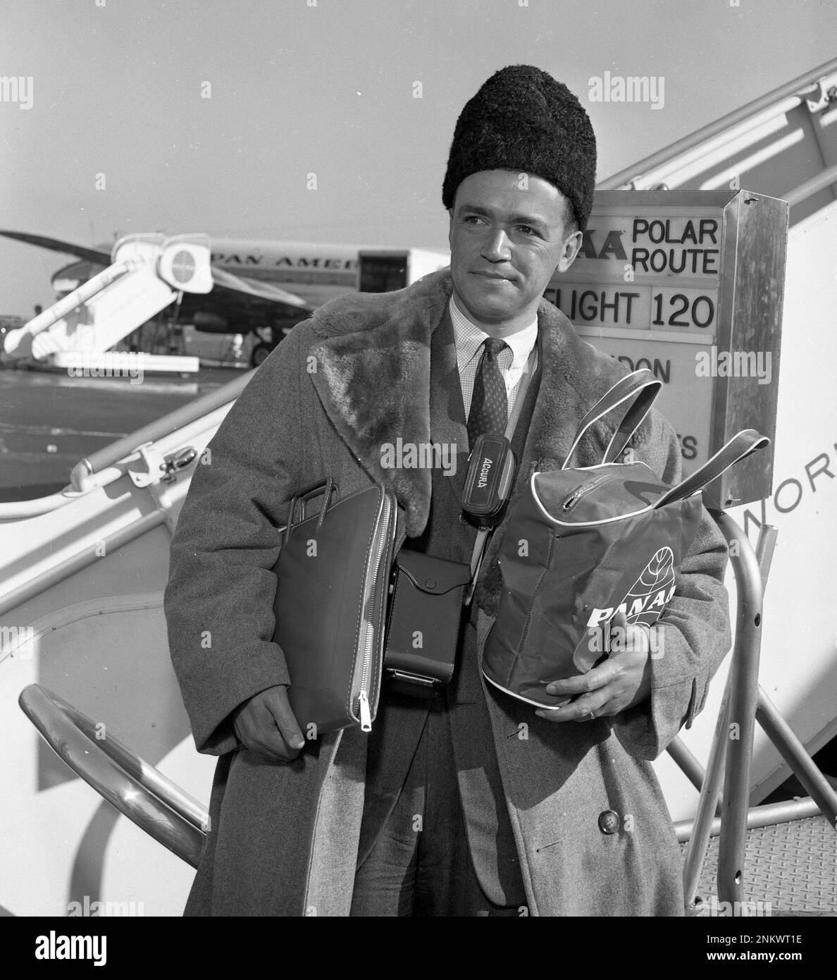 Chronicle reporter Mel Wax is at the airport waiting to join George ...