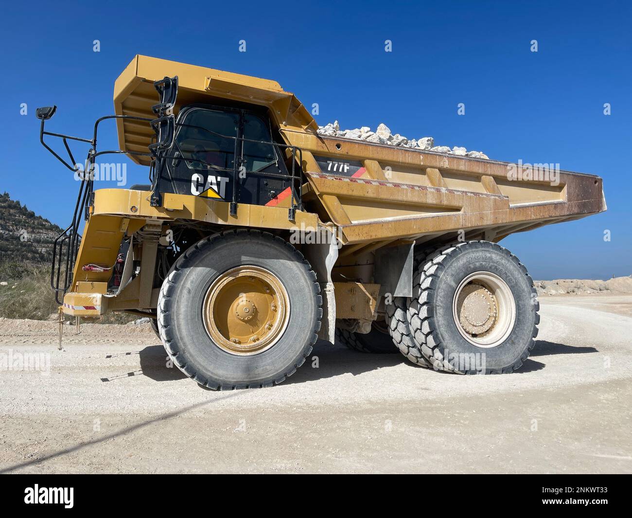 Huge Dumper Transporting The Ore, Limestone Quarry Stock Photo - Alamy