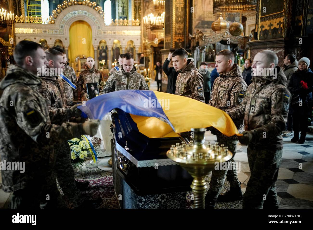 Kiew, Ukraine. 24th Feb, 2023. Comrades of the fallen soldier Yuri ...